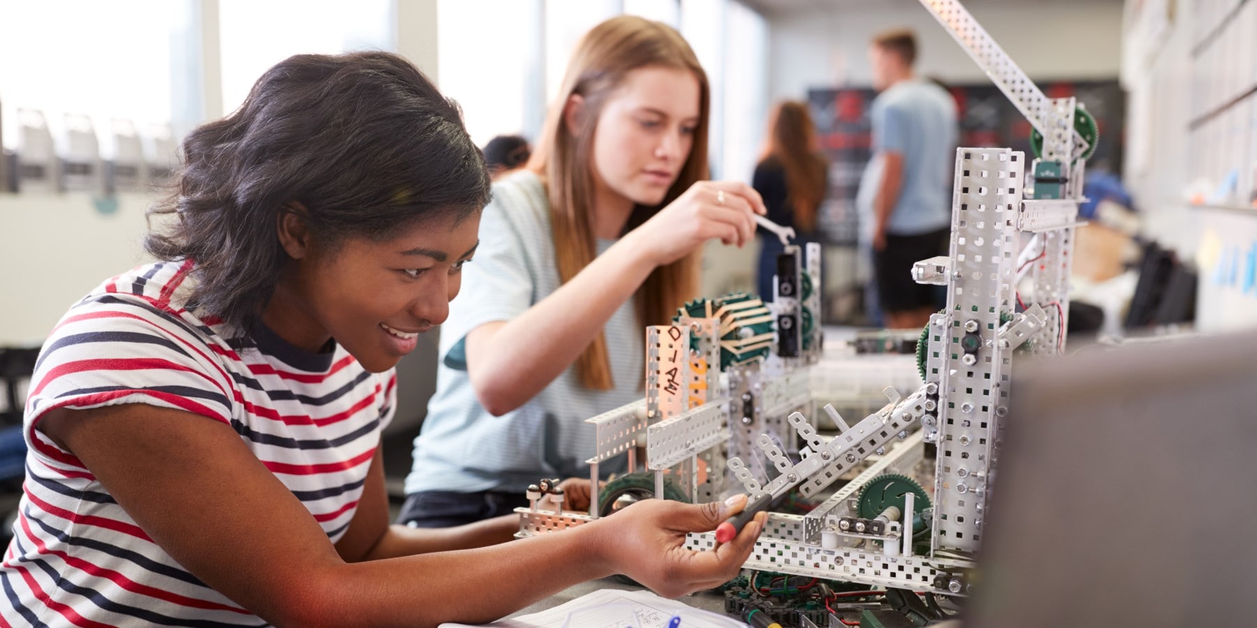 How can we encourage more women and girls to pursue STEM careers?